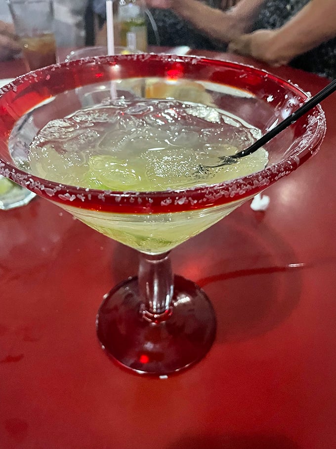 A margarita with a salt rim so perfect it makes you wonder if they hired a mathematician to design it.
