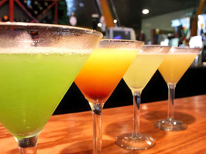 A rainbow of martinis lined up like tasteful jewelry. When happy hour gets serious about the "happy" part of its name.