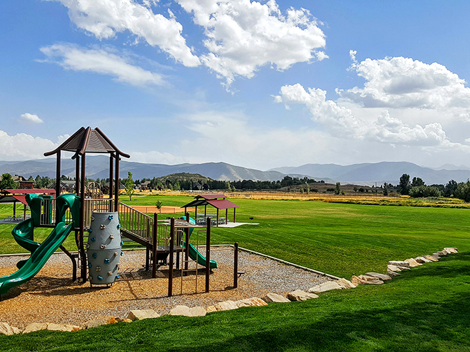 Even the playgrounds in Midway come with million-dollar views. Childhood memories here come standard with mountain backdrops.