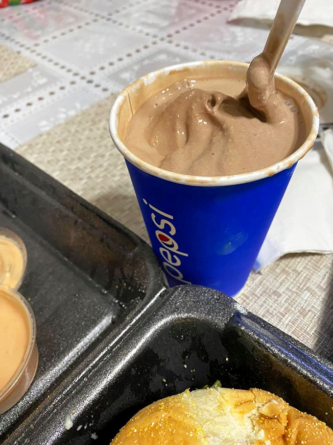 This isn't just a milkshake&mdash;it's a creamy companion for your burger journey, thick enough to require both straw and spoon.