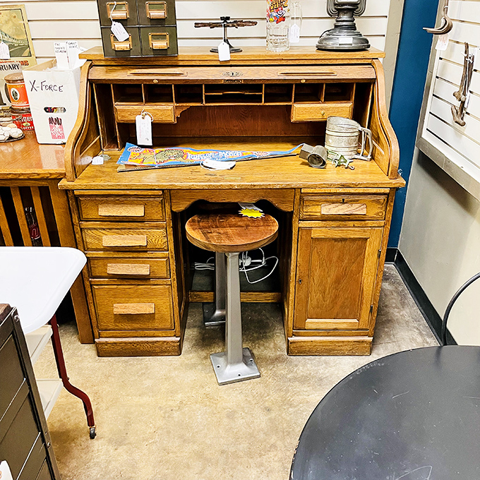 This roll-top desk has hidden more secrets than a small-town banker. Just imagine the letters written and ledgers balanced on this sturdy oak companion.