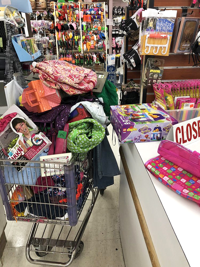 "Half price today" might be the three most beautiful words in the English language. The welcome sign and shopping carts stand ready for serious bargain hunters.