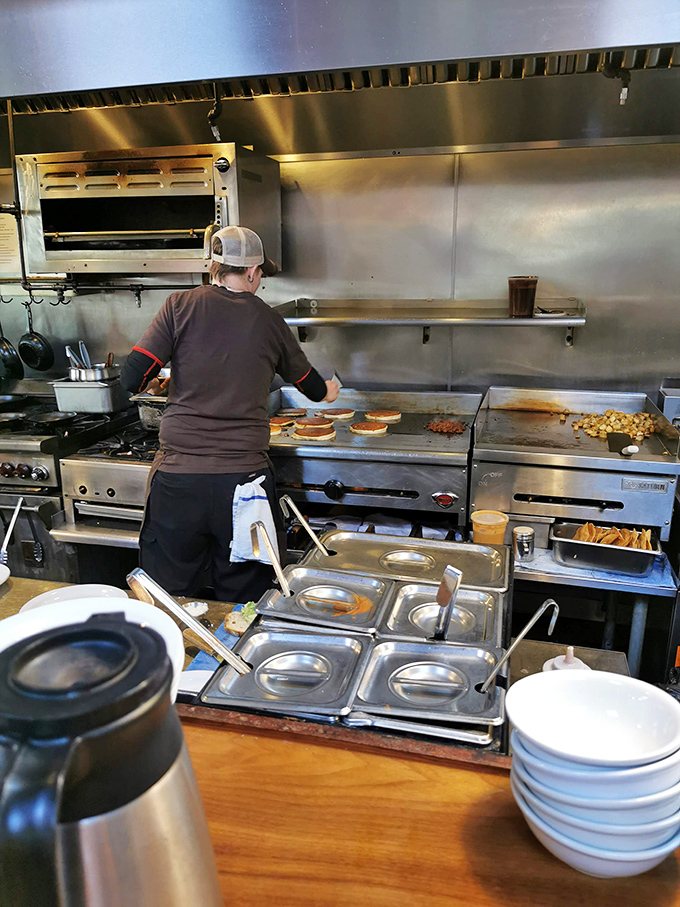 Behind the scenes magic where professional griddle masters handle the food you're too lazy to cook yourself.