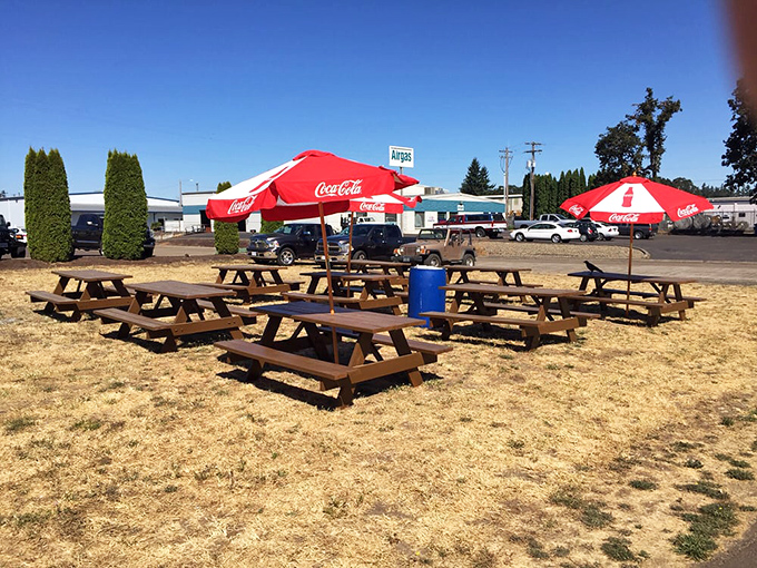 Al fresco feasting under Coca-Cola umbrellas. Because barbecue tastes even better with a side of fresh air.
