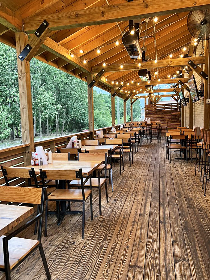 This outdoor patio isn't just seating&mdash;it's theater in the round, with string lights setting the stage for culinary performances served tableside.