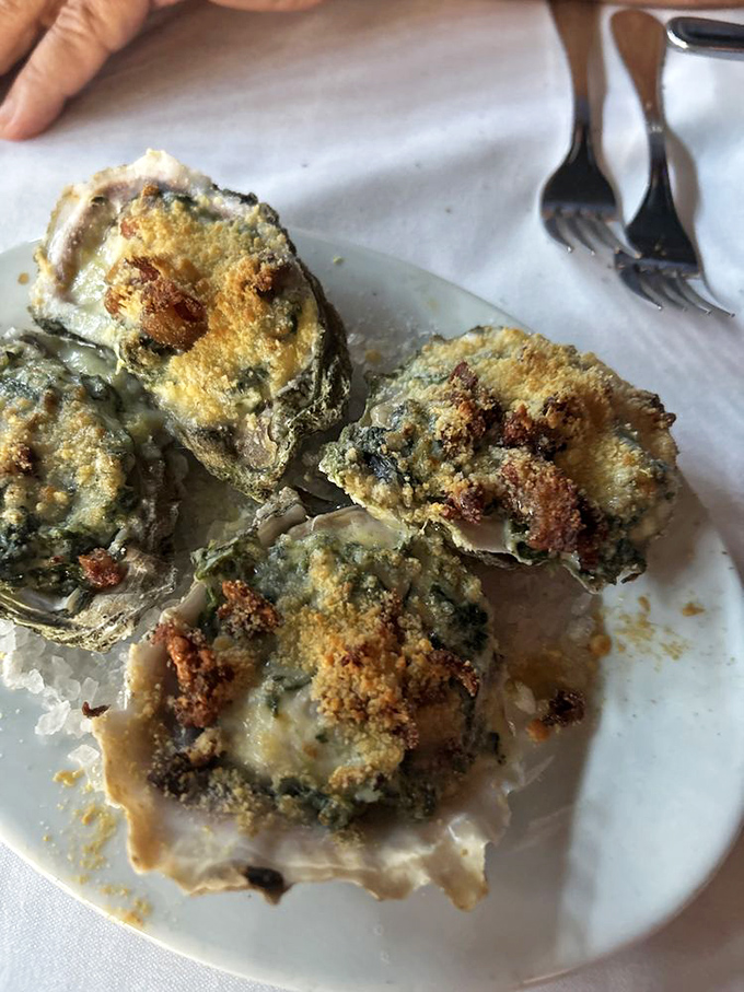 Oysters Rockefeller so rich they probably have their own offshore accounts. That golden crust is what dreams are made of.