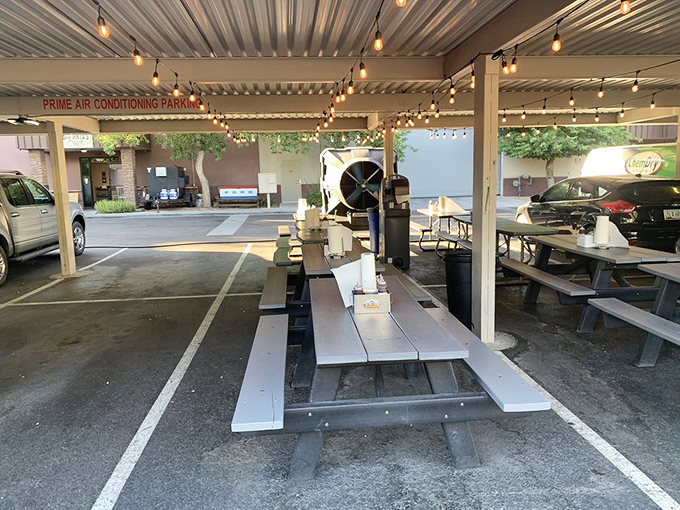 Outdoor seating with string lights where the Arizona evening transforms good barbecue into great memories. Just add friends.