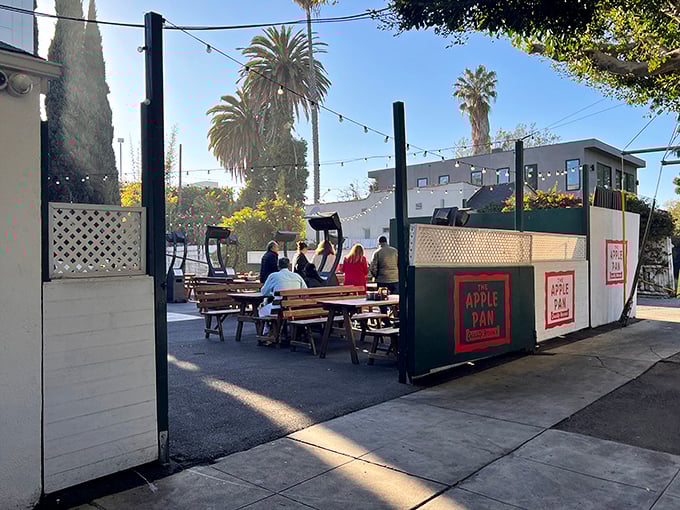 Even LA's perfect weather gets better with a side of Apple Pan. The outdoor seating area offers palm trees with your burger.