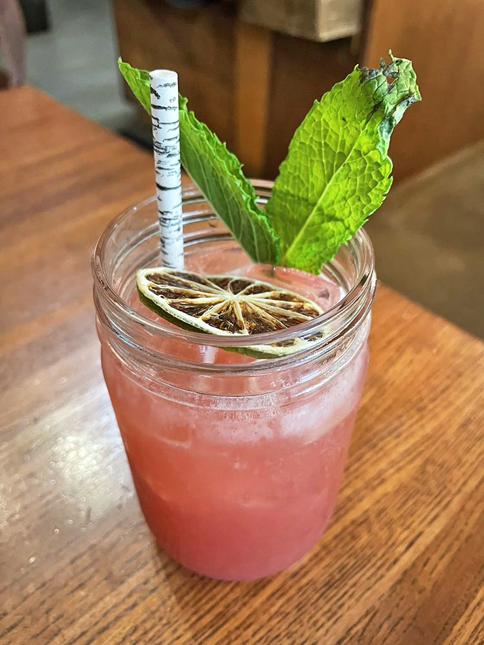 This isn't just a pretty pink drink&mdash;it's summer in a mason jar, complete with mint leaves standing tall like they own the place.