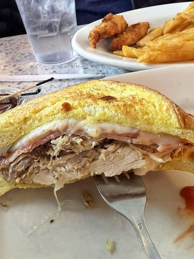 This turkey sandwich isn't just lunch &ndash; it's architectural genius with layers that would make Frank Lloyd Wright take notes.