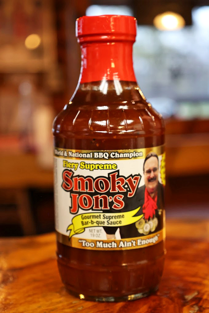 "Too Much Ain't Enough" &ndash; the sauce bottle philosophy that perfectly captures the Wisconsin approach to both barbecue and life.