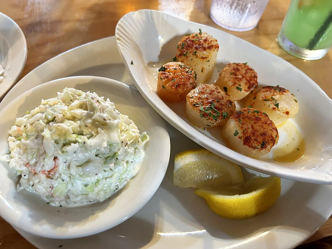 Sea scallops seared to golden perfection&mdash;like little buttery medallions that the ocean personally awarded to your plate for good behavior.