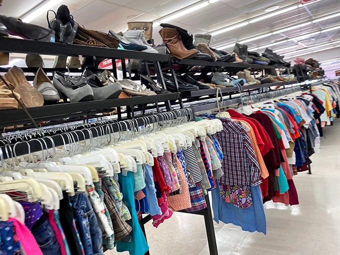 A textile cityscape where shoes reign from above while shirts and blouses create colorful neighborhoods below.