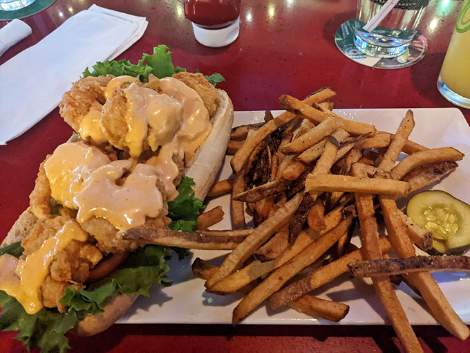 The shrimp po' boy: crispy seafood nestled in a soft roll with just enough sauce. It's the sandwich equivalent of finding the perfect pair of jeans.