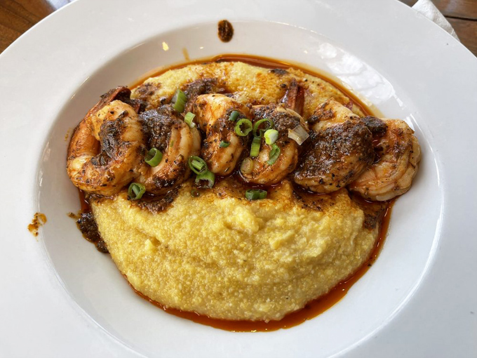 Shrimp and grits that would make a Southerner nod in approval – creamy, savory, and rich enough to make you contemplate licking the plate.