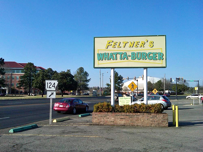 The sign beckons like a lighthouse to hungry travelers&mdash;Feltner's Whatta-Burger has been guiding appetites home since 1967.
