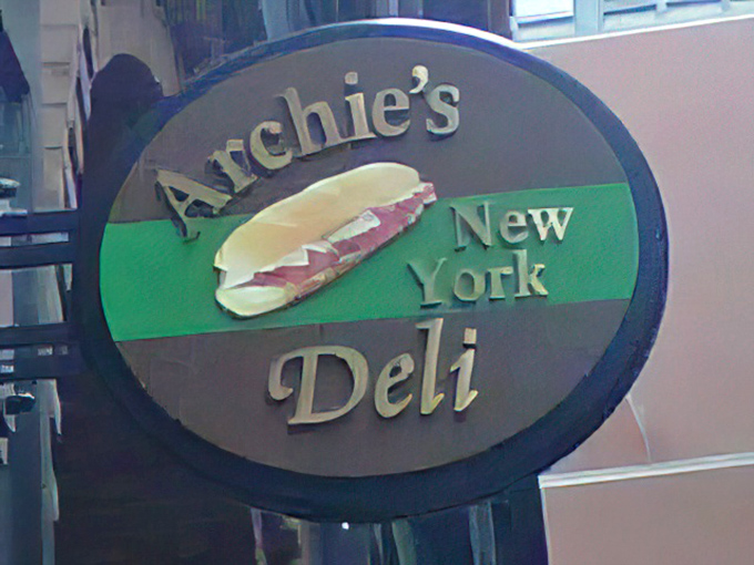 That neon glow isn't just signage&mdash;it's a lighthouse for the sandwich-starved souls of Boston, guiding them to deli salvation.