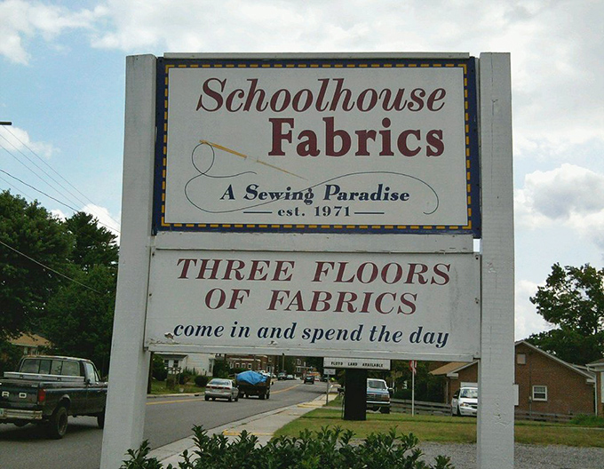 "Three floors of fabrics, come in and spend the day"&mdash;a sign that's both an invitation and a warning about your schedule and wallet.