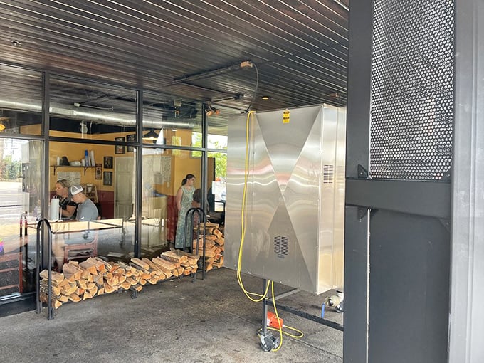 The not-so-secret behind the magic &ndash; apple and cherry wood stacked like treasure, waiting to transform ordinary meat into extraordinary memories.