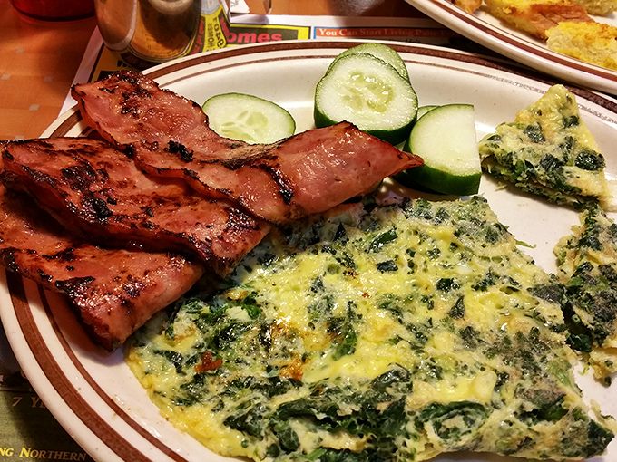 A spinach frittata that Popeye would approve of, with ham that doesn't play a supporting role. Fresh cucumber slices offer a crisp counterpoint to the savory main event.