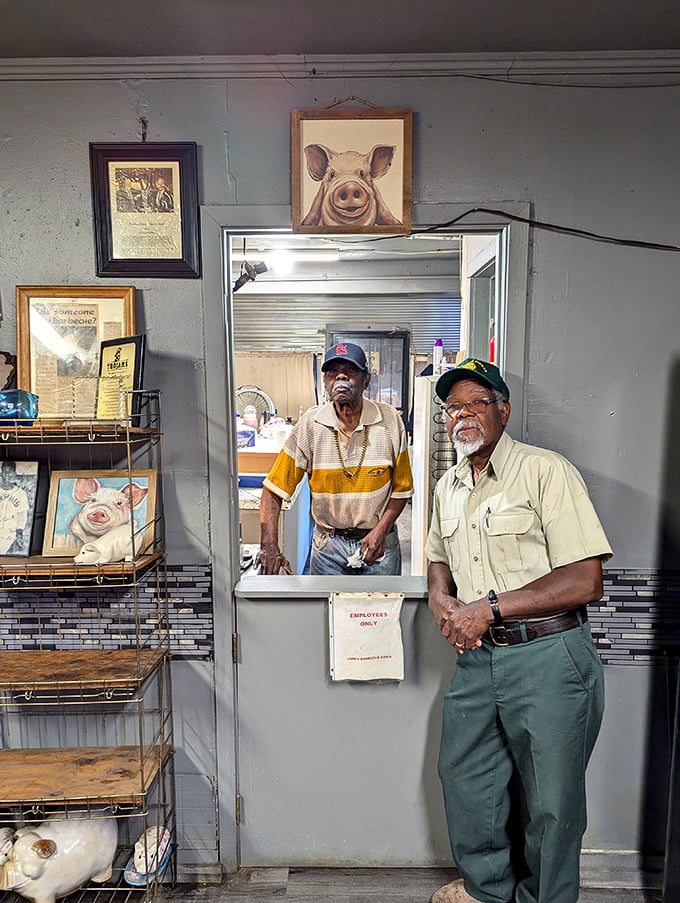 The keepers of the flame. Decades of barbecue wisdom embodied in the steady hands and watchful eyes of those who maintain this culinary tradition.