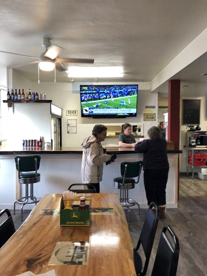 A glimpse of Dover's living room, where watching the game becomes a community affair rather than a solitary activity.