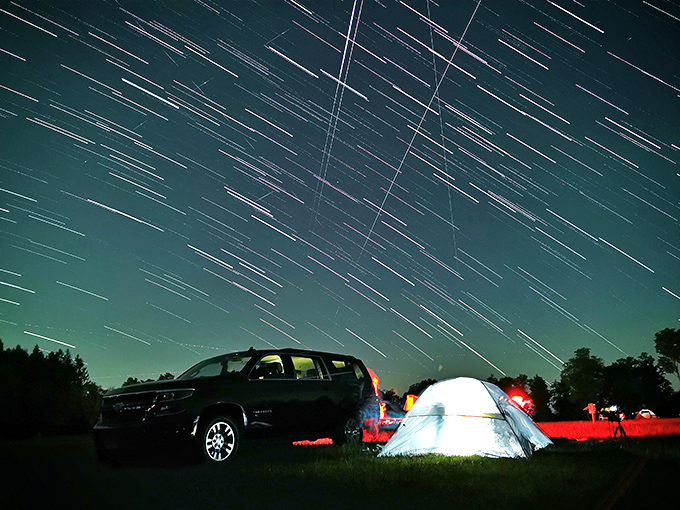 Star trails streak across the night sky like celestial speedways—proof that even the universe doesn't stand still for a perfect Pennsylvania night.