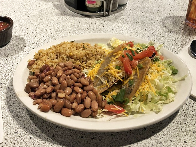 Southwestern vacation on a plate &ndash; these tacos flanked by rice and beans create that "siesta might be necessary afterward" kind of meal.