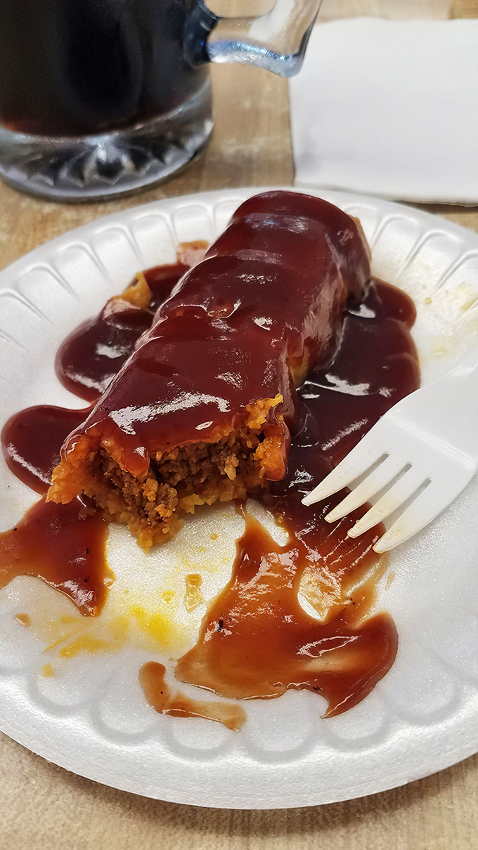 The tamale, smothered in rich chili sauce, offers a Midwest interpretation of comfort food that's been pleasing St. Louis palates for generations.