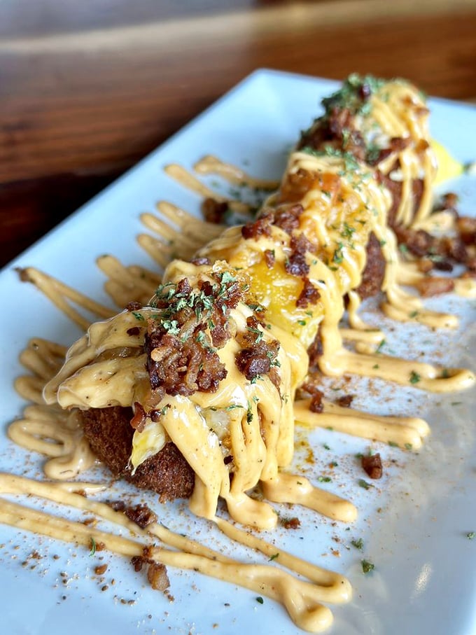 Cheesy, bacon-y perfection drizzled with sauce that would make a grown person weep. Comfort food that hugs your soul while high-fiving your taste buds.