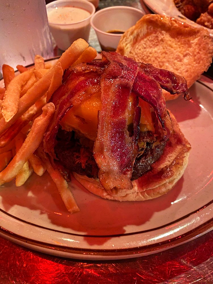 The Rebel Outlaw burger doesn't just break the rules; it rewrites them with bacon ink and cheese punctuation. Worth every napkin.