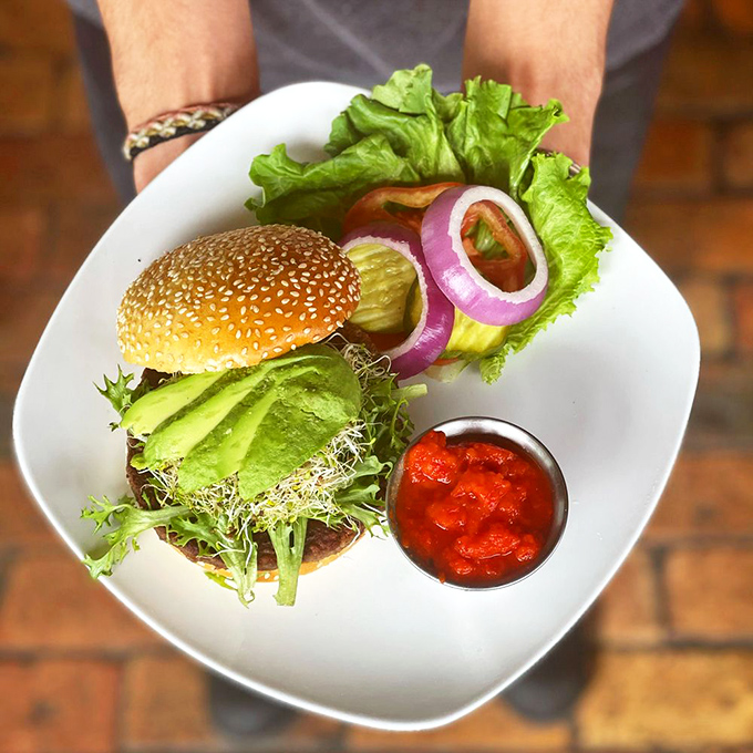 A turkey burger that doesn't apologize for not being beef. Those sprouts and avocado aren't just toppings&mdash;they're a lifestyle statement.