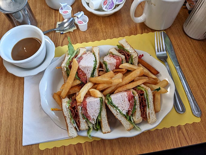 A club sandwich that's engineered for maximum satisfaction&mdash;triple-decker architecture with crispy fries as the perfect supporting cast.
