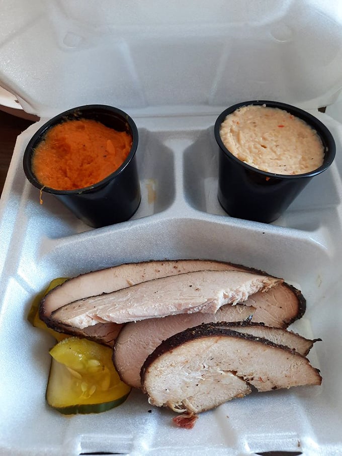 Turkey that defies the "dry poultry" stereotype. Those sauce cups contain possibilities, but this bird stands proudly on its own smoky merits.