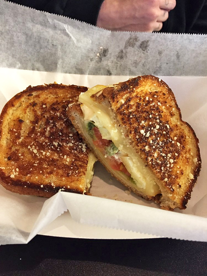 Proof that vegetarian options can inspire the same lustful gaze as their meaty counterparts&mdash;melty cheese embracing fresh vegetables in toasty harmony.