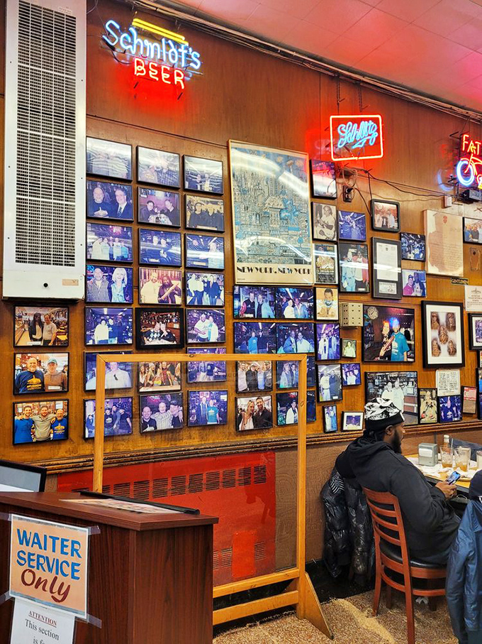 The wall of fame where celebrities come to worship at the altar of pastrami. Even the famous understand some things transcend status.