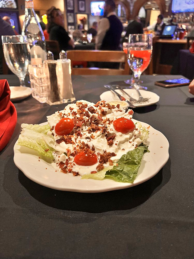 A wedge salad that turns the humble iceberg into a canvas for bacon bits and blue cheese—proving vegetables can have fun too.