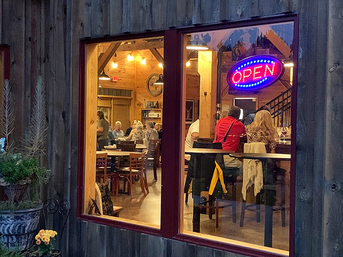 Peering through the window at nightfall reveals the warm glow that's pulled countless travelers off the road for "just one bite."