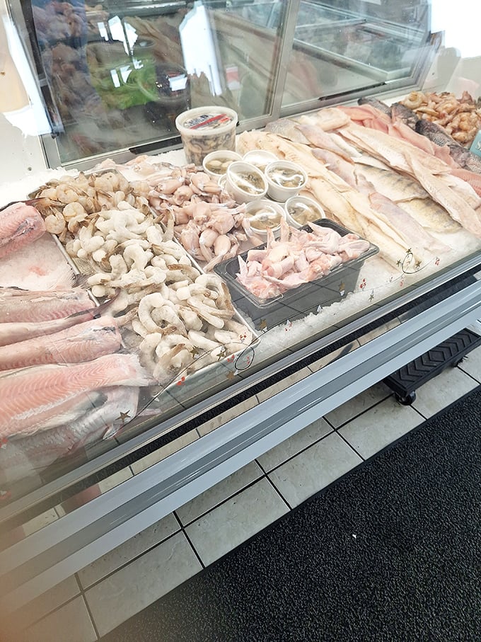 The display case reveals the day's catch—a Midwestern seafood mirage that somehow delivers on its impossible promise.