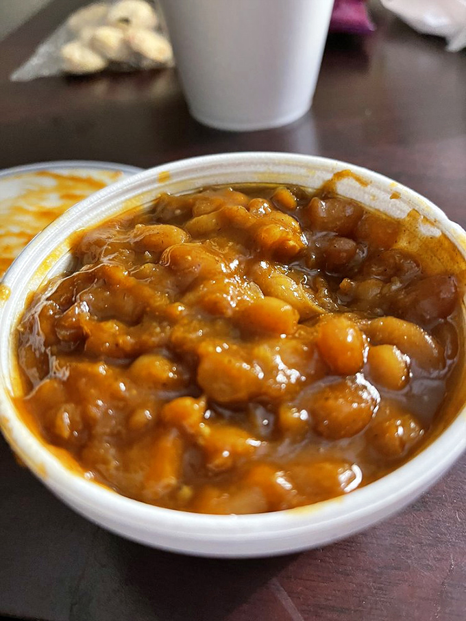 Those baked beans aren't just a side dish; they're the supporting actor who sometimes steals the scene from the headlining hot dog.