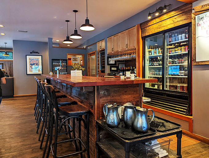 The bar area whispers "craft" without shouting it &ndash; rustic wood, gleaming taps, and refrigerators stocked with local beverages promise liquid happiness.