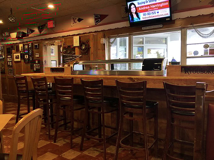 The bar's nautical decorations and comfortable seating invite you to settle in, share stories, and perhaps learn why this hidden gem has thrived for generations.