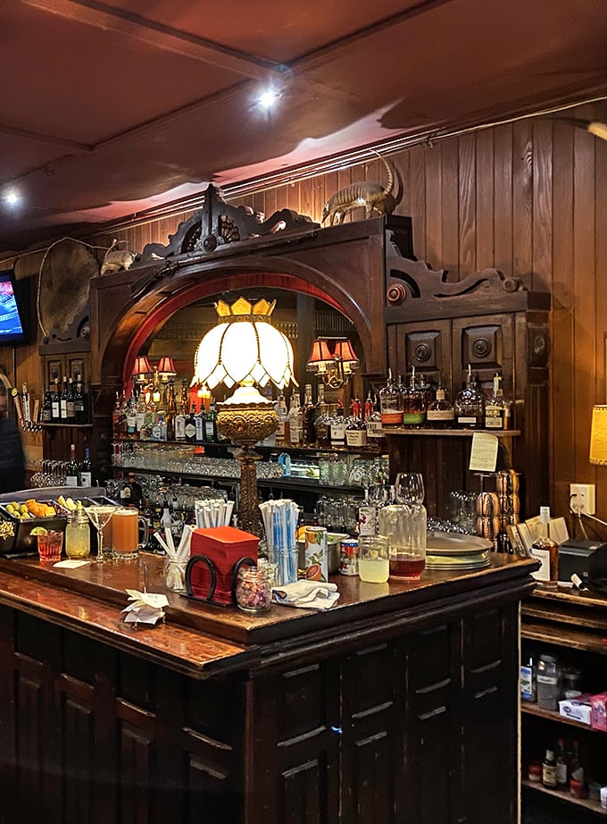 A wood-framed bar that's seen its share of celebrations, with stained glass lamps that transform ordinary drinks into special occasions. 