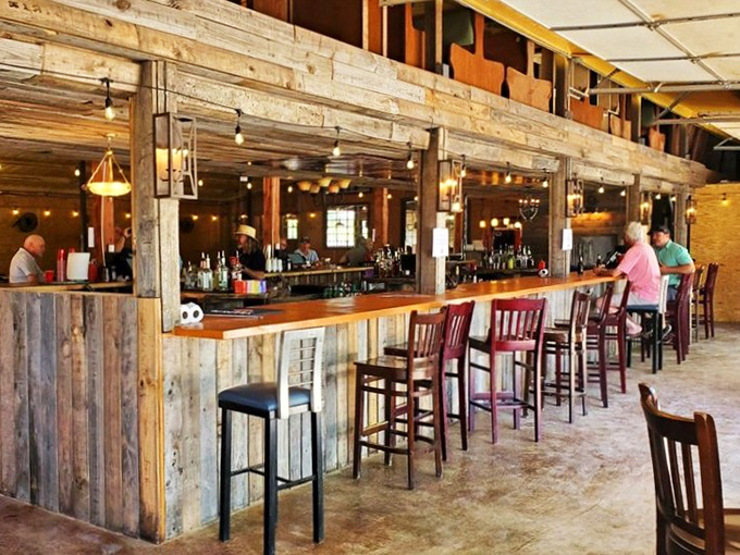 The bar area, where reclaimed wood creates the perfect backdrop for making new friends or toasting old ones.