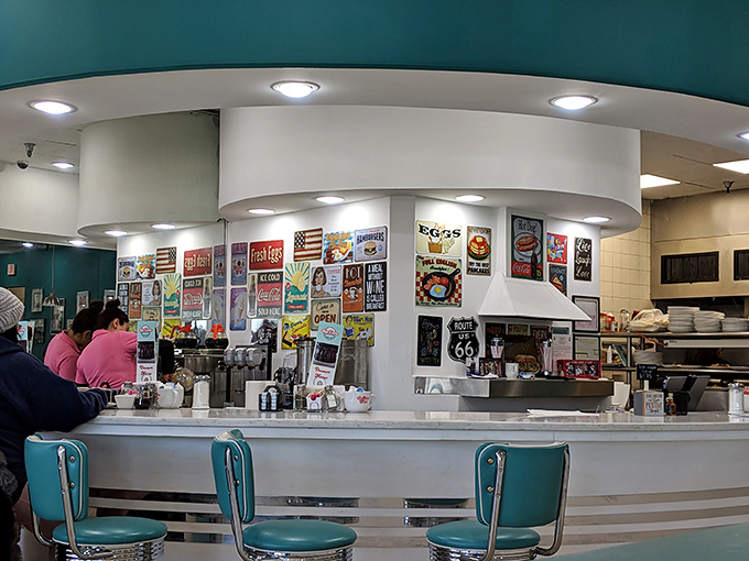 The counter where breakfast dreams come true. Vintage signs and memorabilia create the backdrop for morning rituals and afternoon pick-me-ups.