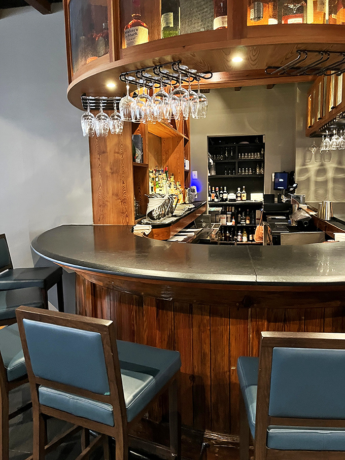 The bar at Magnolias isn't just where drinks are made&mdash;it's where strangers become friends and food philosophies are passionately debated.