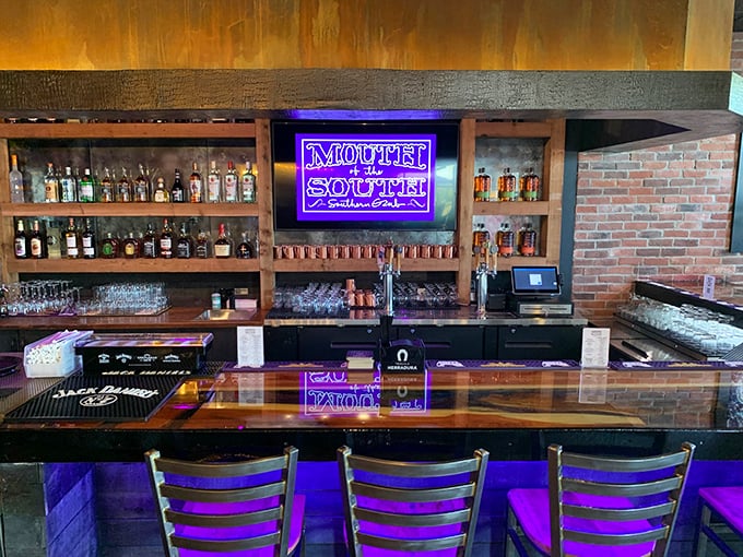 This isn't just a bar—it's a liquid library. That purple glow hints at the magic that happens when New Orleans spirits meet Midwestern hospitality.