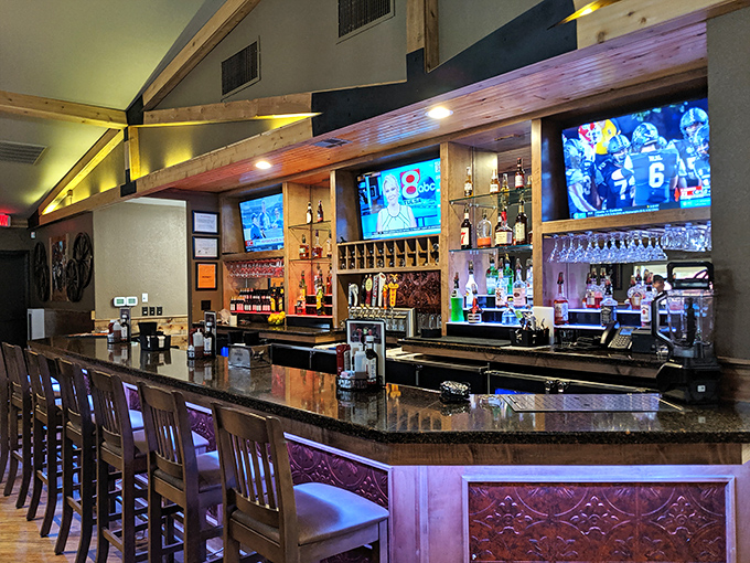 The bar at Callahan's&mdash;where sports on TV and spirits behind glass create the perfect formula for unwinding. Wood and warmth everywhere you look.
