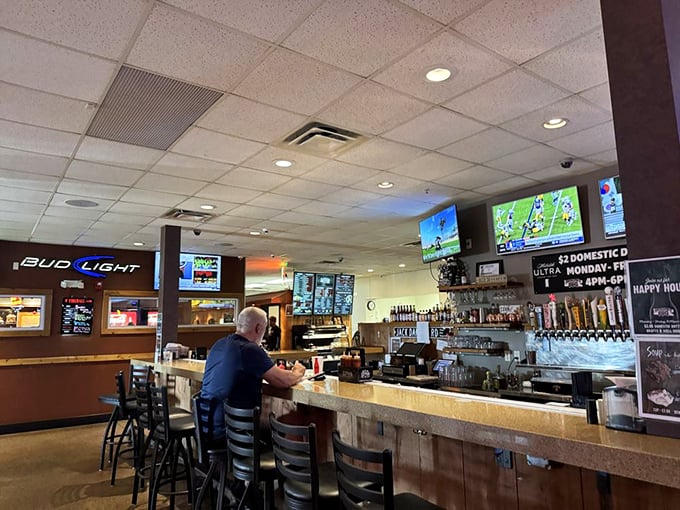 The bar at Smokey D's: where BBQ pilgrims rehydrate and swap stories of the best bites they've ever had.