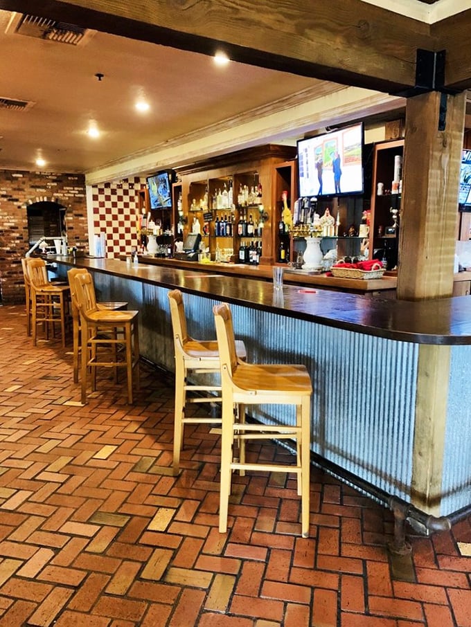 The bar where many a Kansas battle plan has been drawn up over cold beers and hot debates about white meat versus dark.